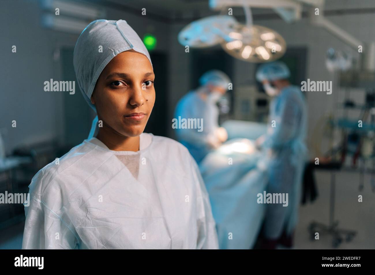 Closeup portrait of African-American female nurse in surgical uniform ...