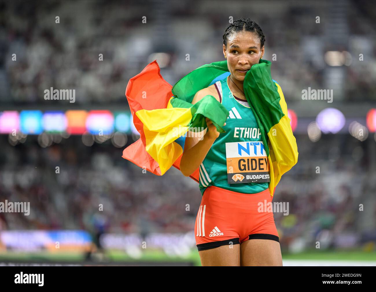 Letesenbet Gidey celebrating his medal with the flag in the Budapest ...