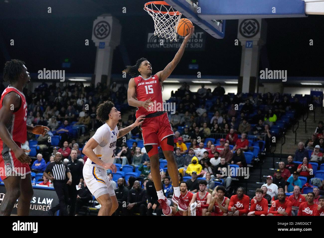 New Mexico forward JT Toppin drives to the basket past San Jose State ...