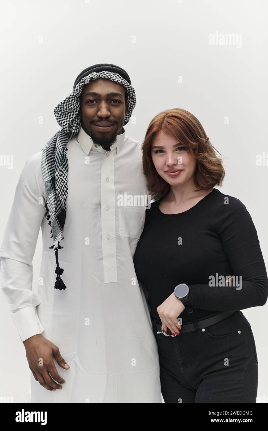 Muslim entrepreneur and a contemporary red-haired girl strike a pose ...
