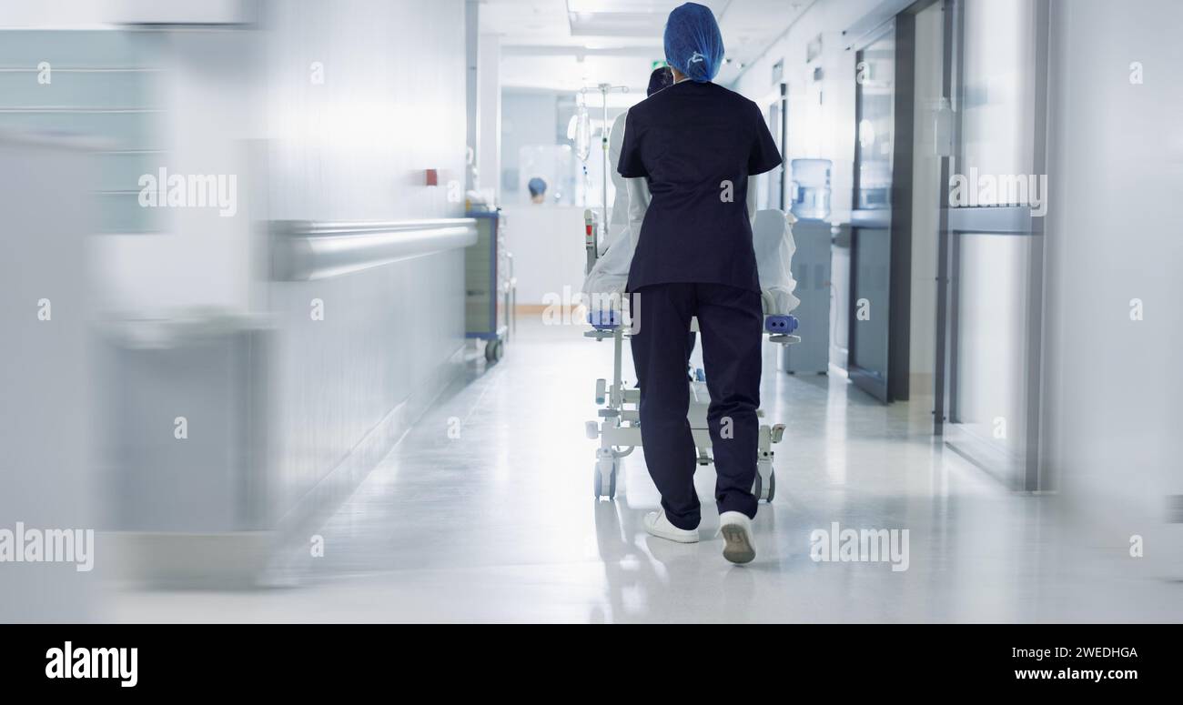 Patient, bed and nurse walking in hospital, hallway or corridor to ...