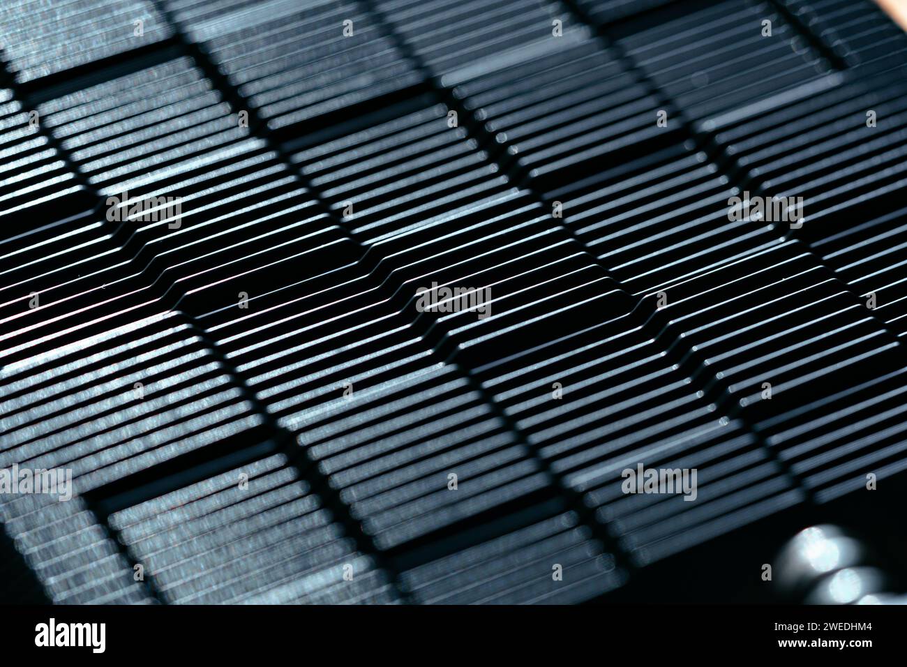 Cooler fan grille of computer power supply close up Stock Photo - Alamy
