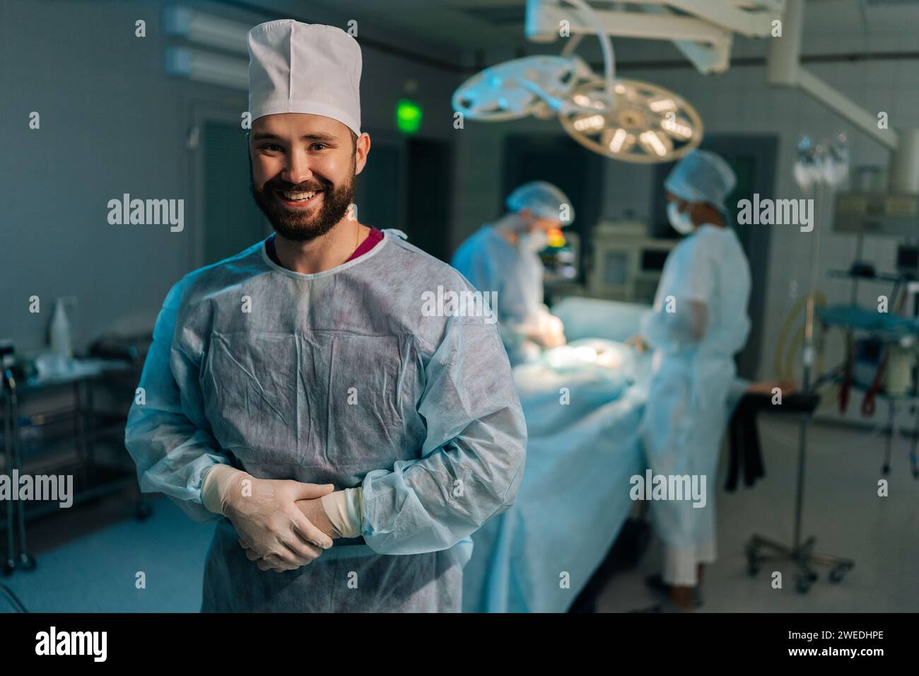 Bearded caucasian surgeon in surgical hi-res stock photography and ...