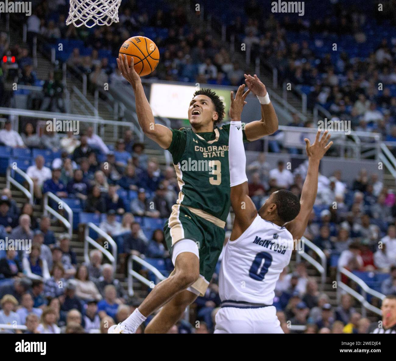Colorado State guard Josiah Strong (3) shoots over Nevada guard Hunter ...
