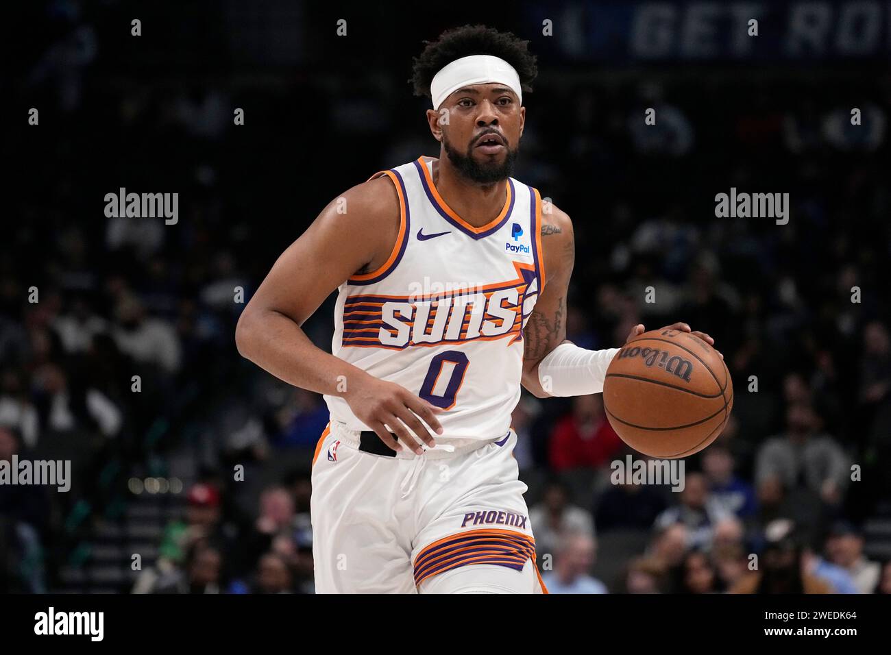 Phoenix Suns guard Jordan Goodwin handles the ball as he works against ...