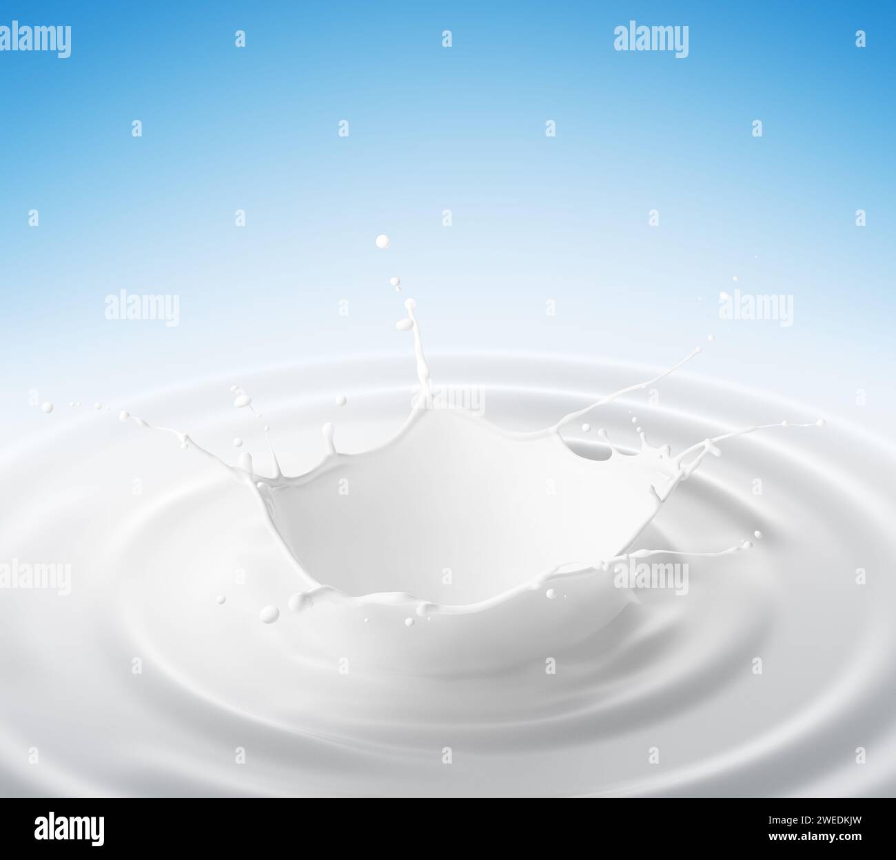 Close up of a beautiful milk splash with graceful crown over white ...