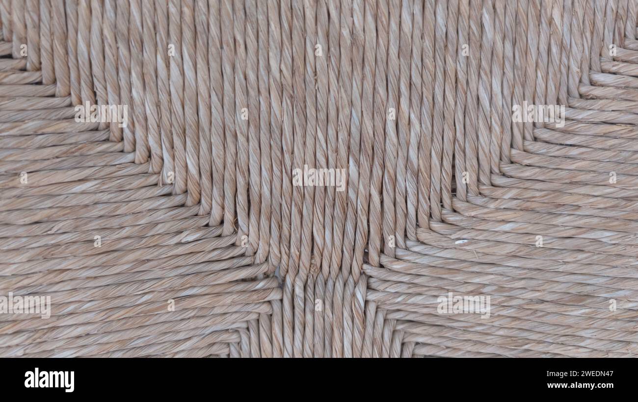 Background texture of brown straws chair weave pattern Stock Photo - Alamy