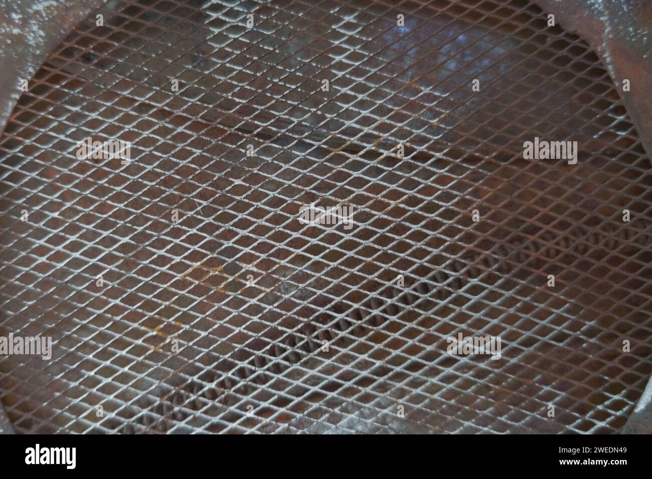 metal texture with wire mesh netting began to rust steel for background ...