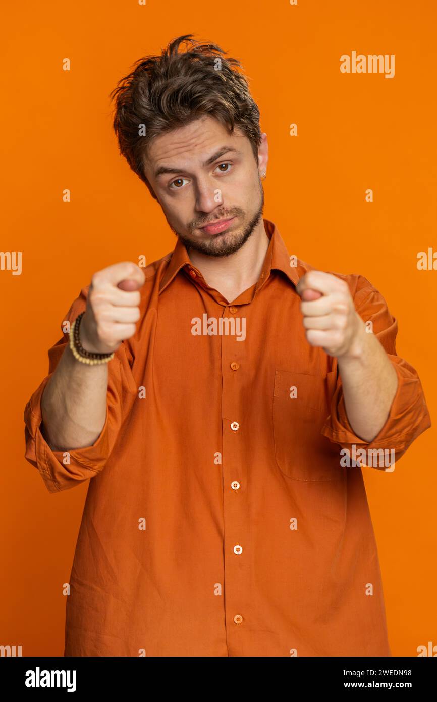 Greedy avaricious Caucasian man showing fig negative gesture you don't ...