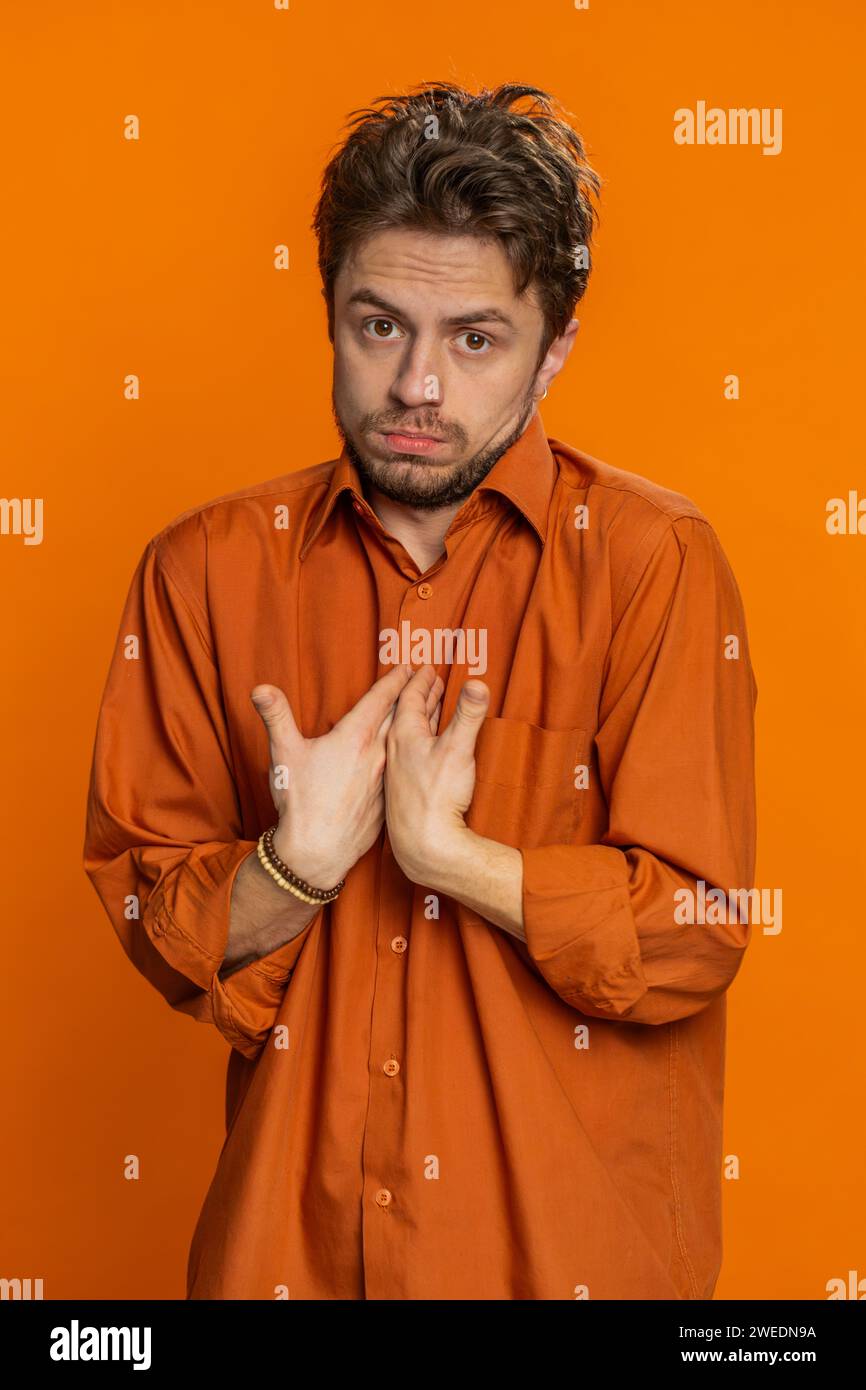 I am not guilty. Confused Caucasian man pointing fingers himself ask ...