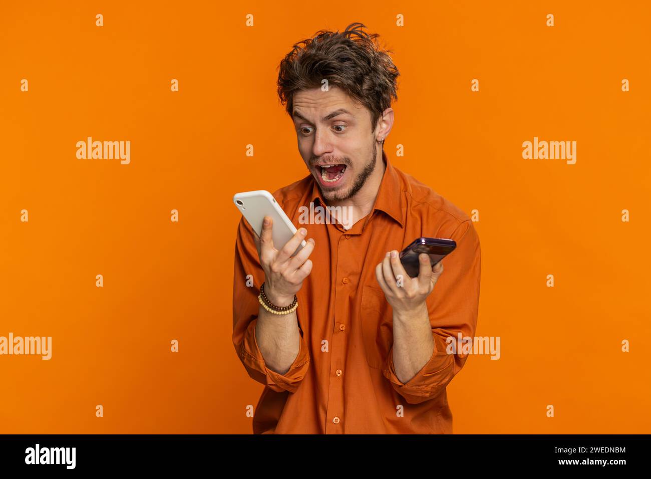 Irritated nervous stressed Caucasian man talking screaming on two ...