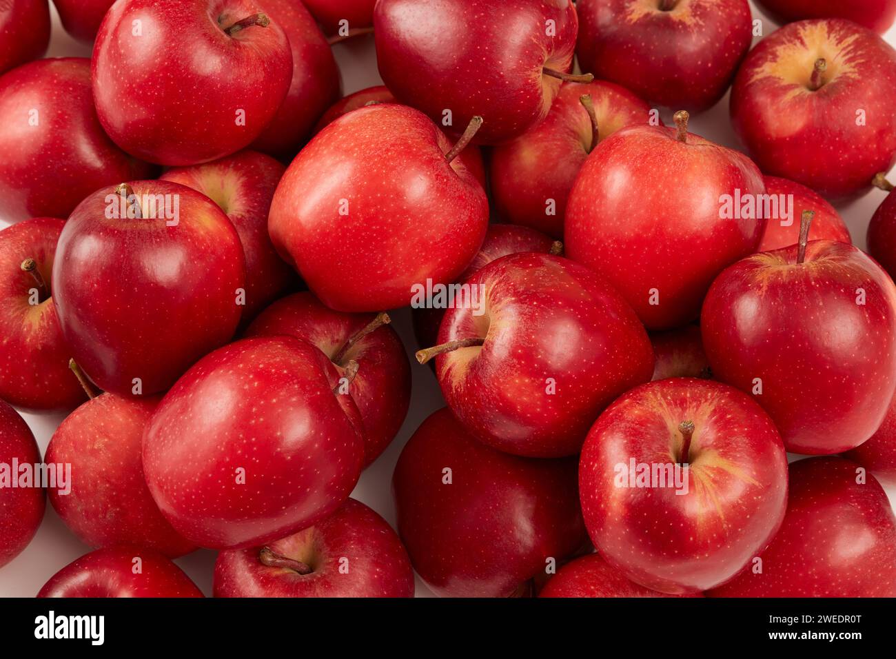 Top view of lots of messy red ripe apples. Background for advertising ...