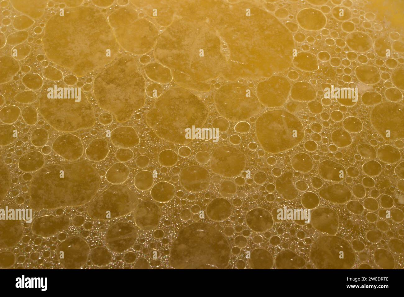 Full frame of oil bubbles after boiling meat Stock Photo - Alamy