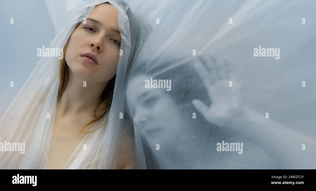 Young beauty woman who looks like an innocent renaissance Madonna is ...