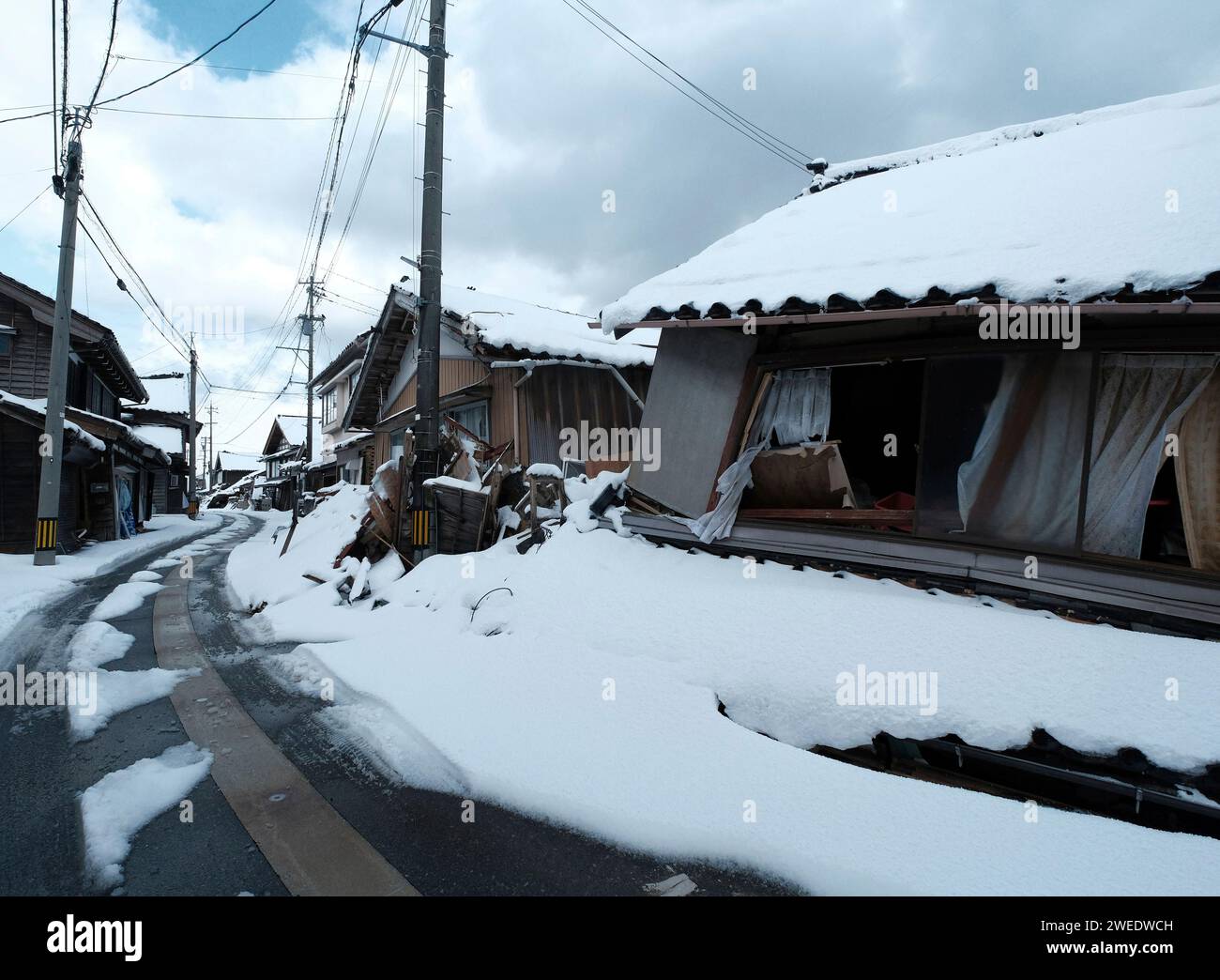 A photo shows a disaster-stricken area damaged by a massive earthquake ...