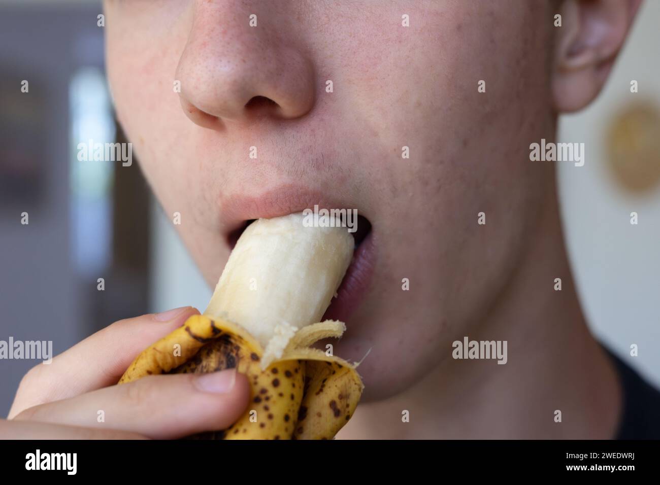 Biting banana peel hi-res stock photography and images - Alamy