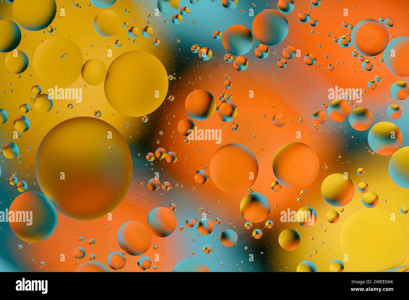 orange and blue circles like planets microcosm galaxy 2 Stock Photo - Alamy