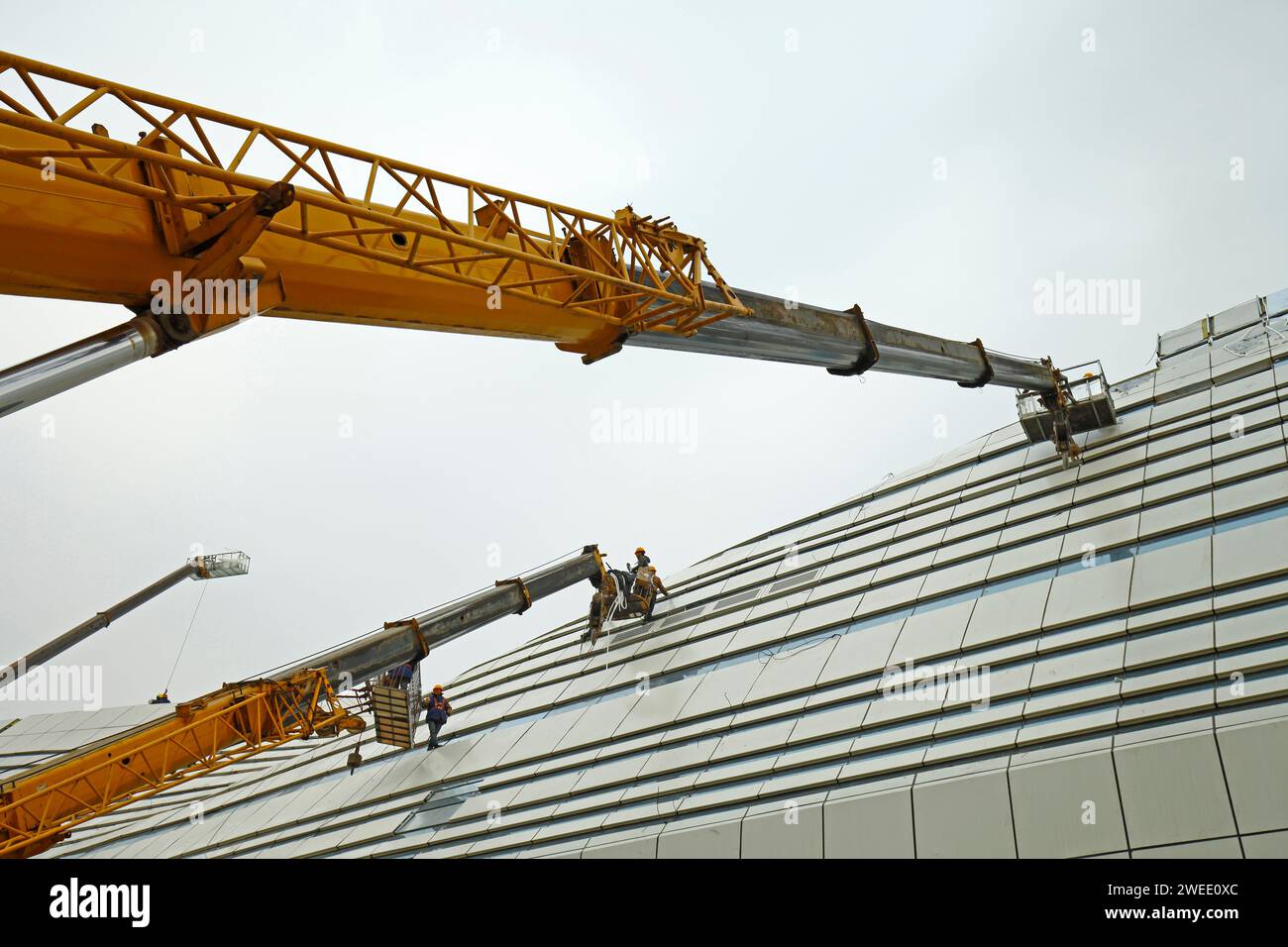Construction workers in mobile hydraulic construction platform Stock ...
