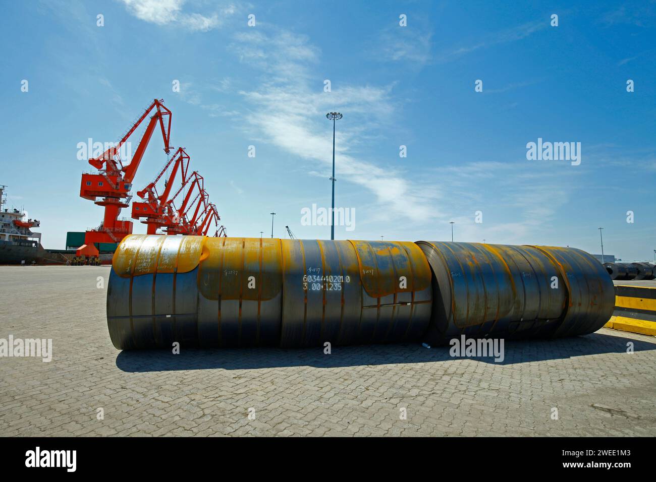 roll steel in harbor , Cold rolled steel coils Stock Photo - Alamy