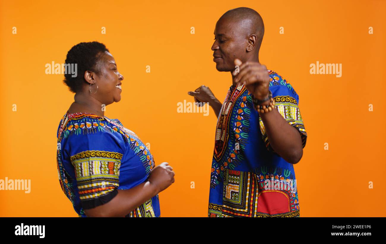 African american partners having fun dancing in studio, enjoying their ...