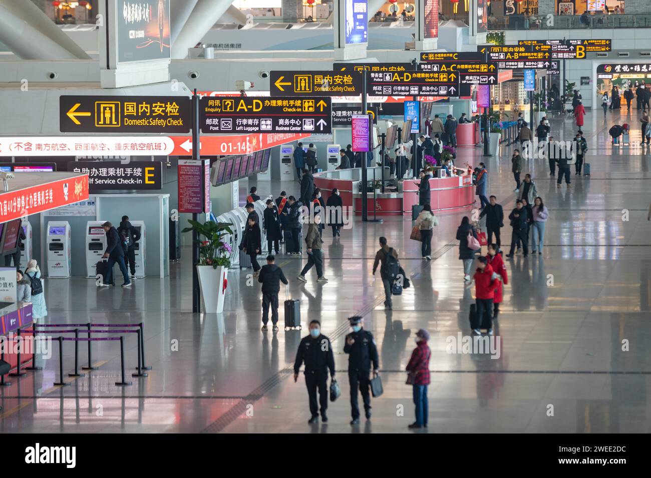 Passengers wait for planes at Zhengzhou Xinzheng International Airport ...