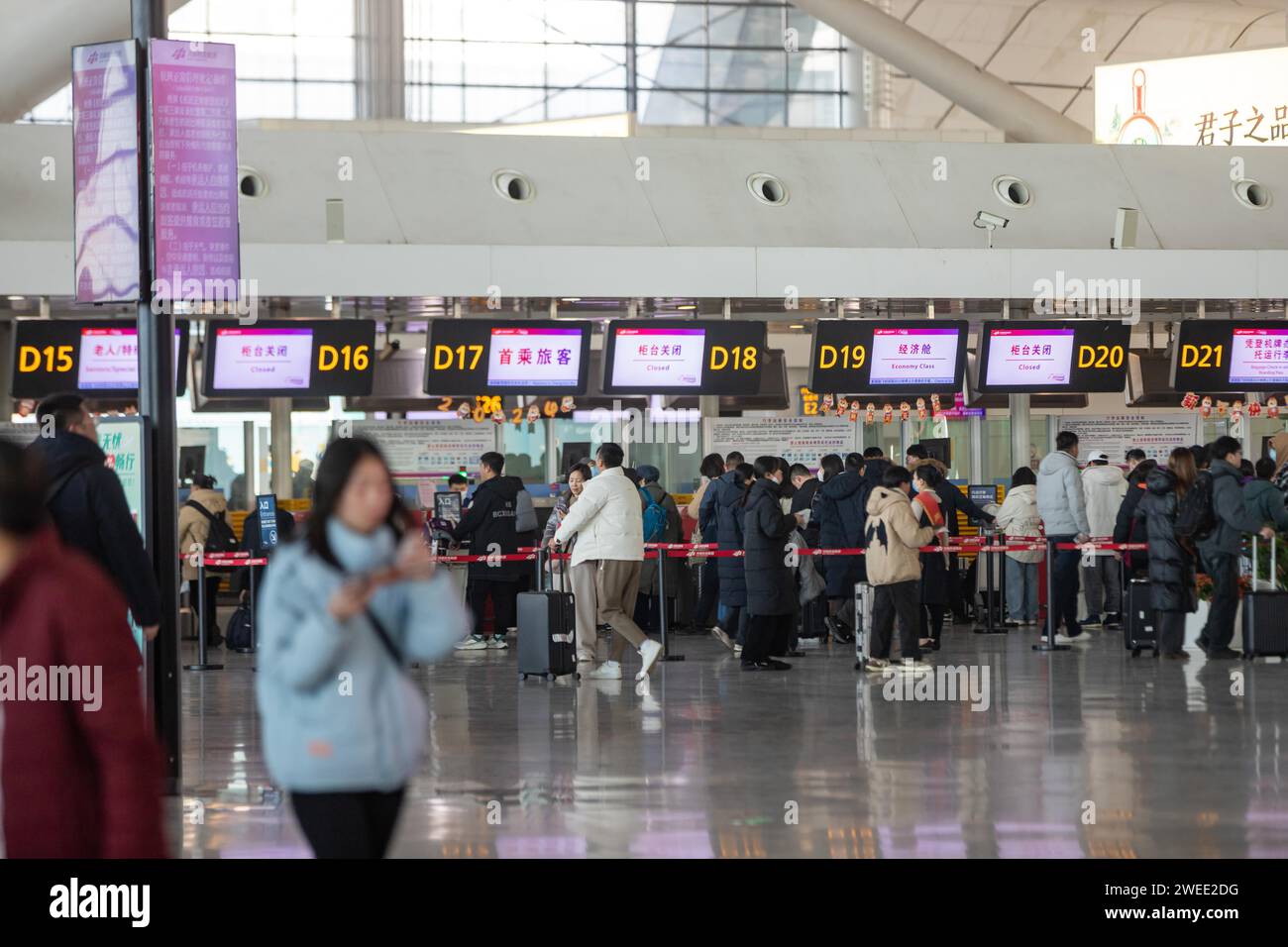 Passengers wait for planes at Zhengzhou Xinzheng International Airport ...