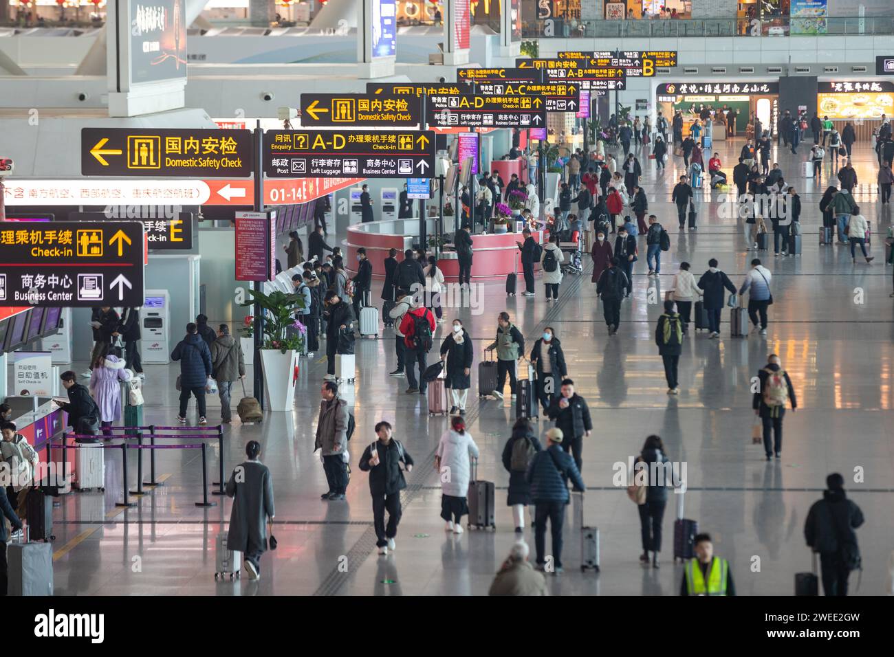 Passengers wait for planes at Zhengzhou Xinzheng International Airport ...