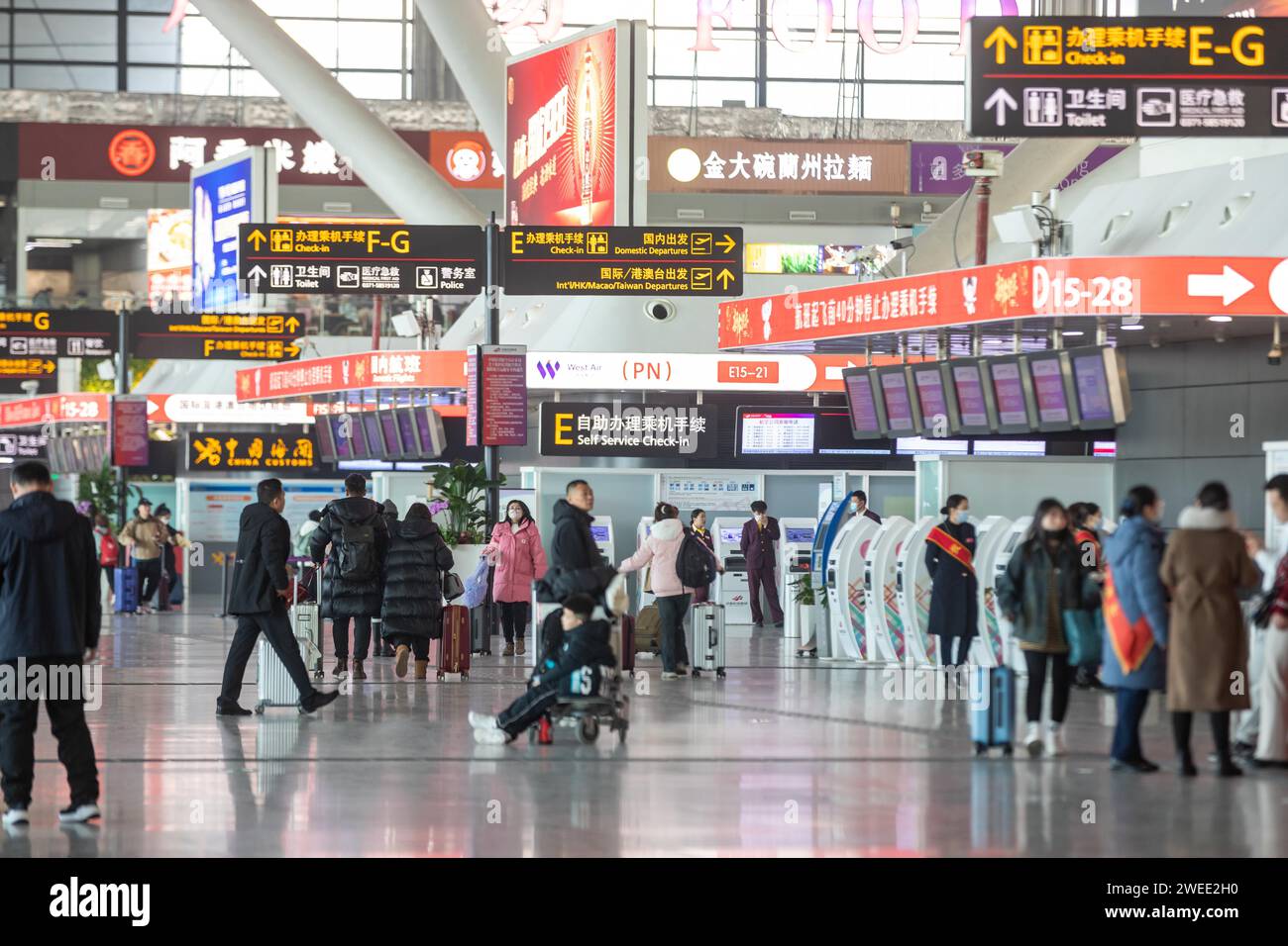Passengers wait for planes at Zhengzhou Xinzheng International Airport ...