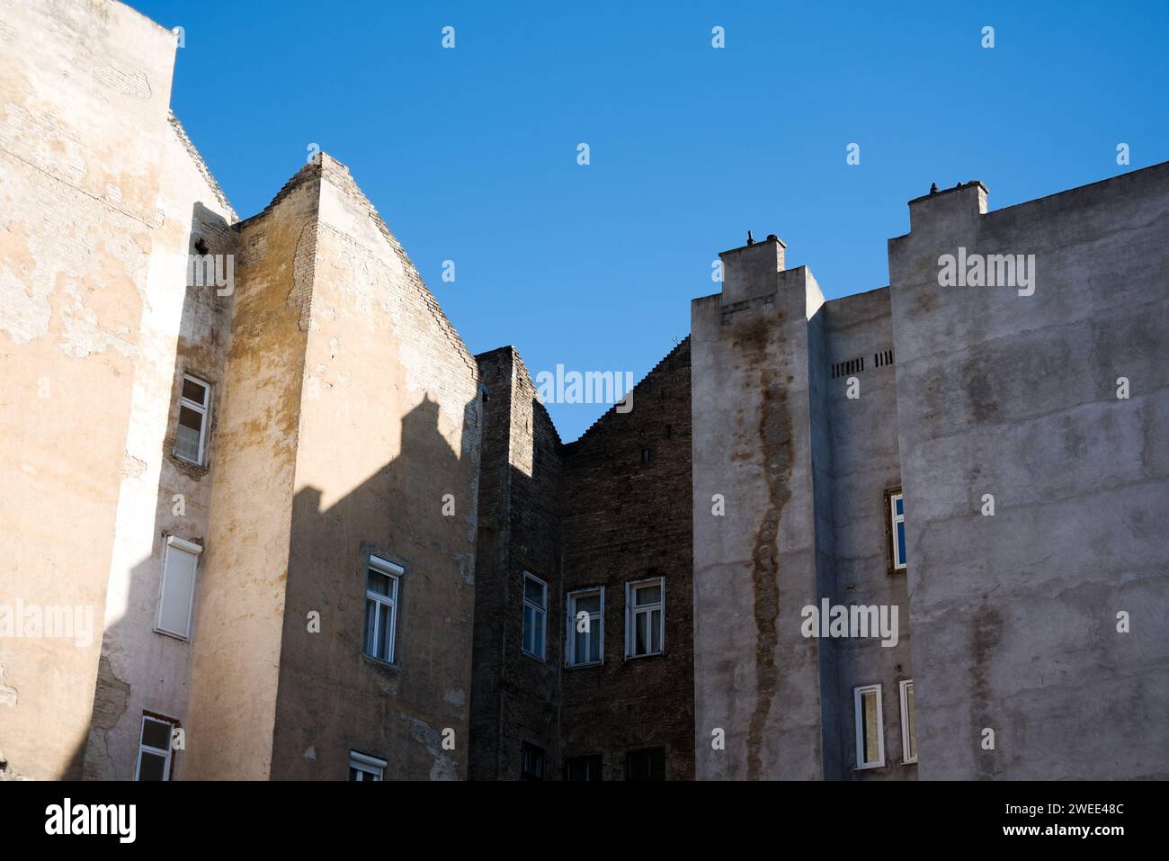 Old residential building corner Stock Photo - Alamy