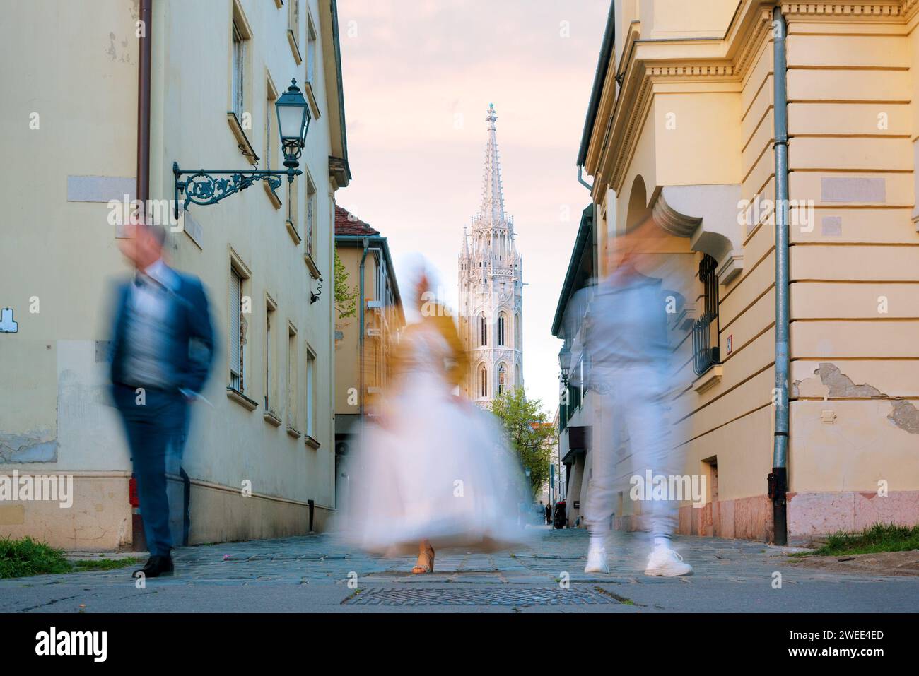 Matthias church view in narrow street, blurred group of people Stock ...
