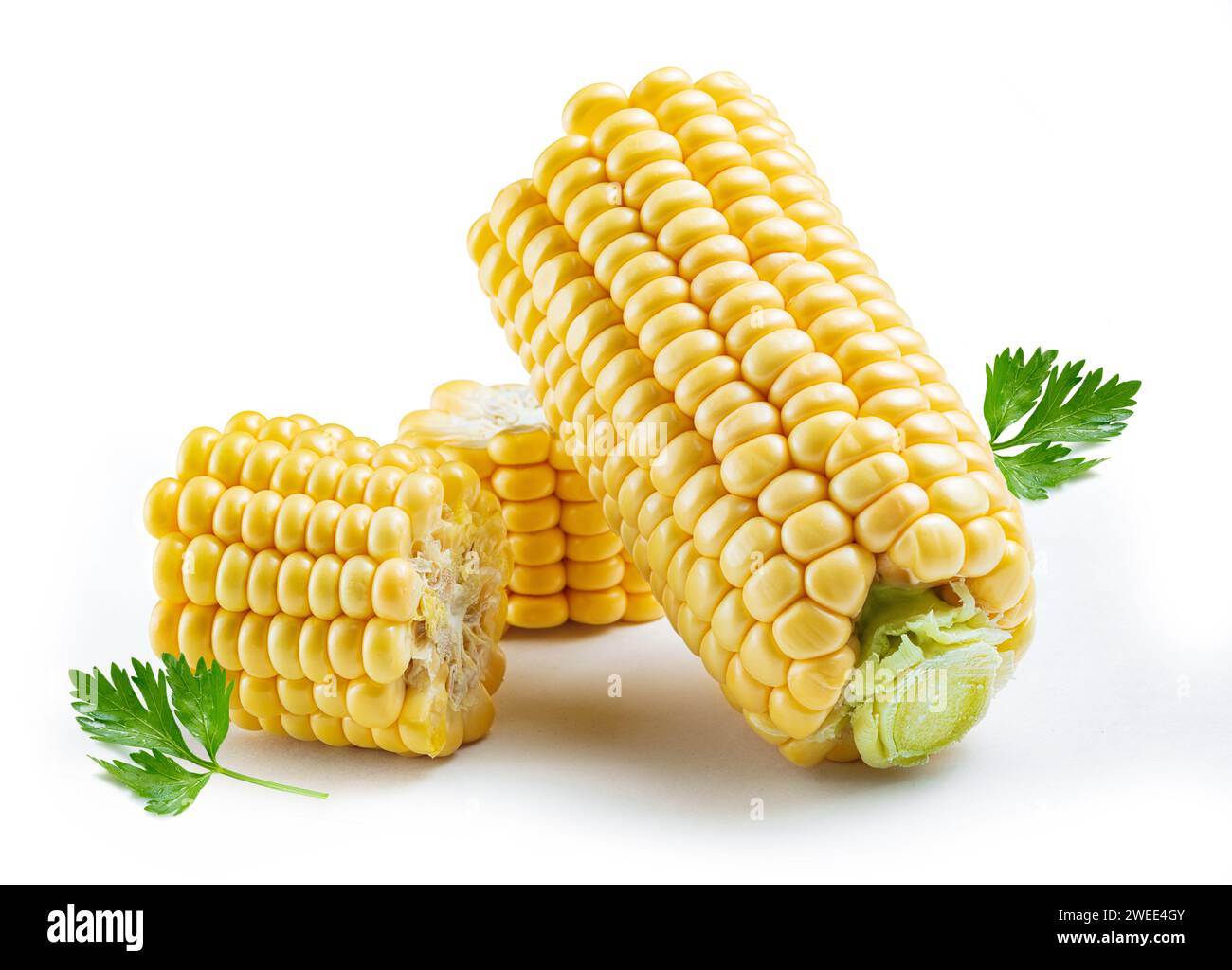 natural sweetcorn with parsley isolated white background Stock Photo ...