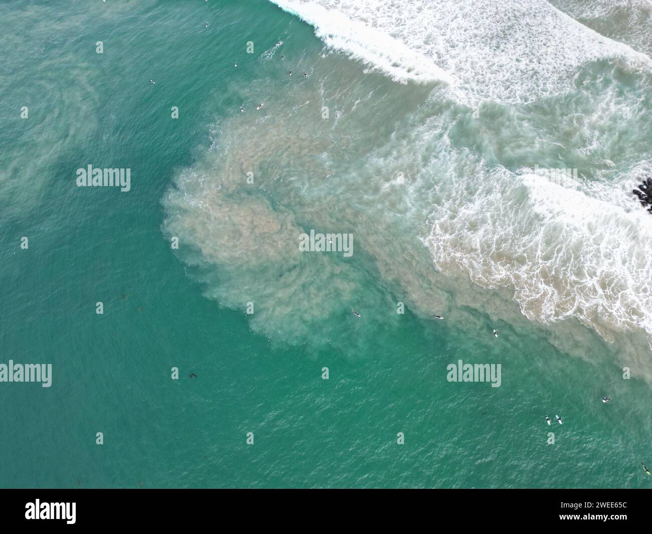 Aerial view of the ocean waves, captured from a bird's eye perspective ...
