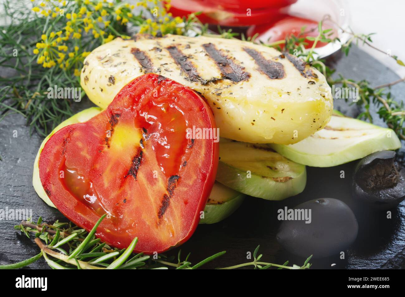 Halloumi cheese fried with aromatic herbs rosemary and thyme and ...