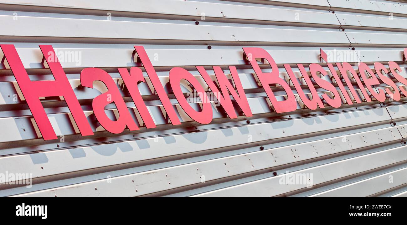 Harlow business sign Stock Photo - Alamy