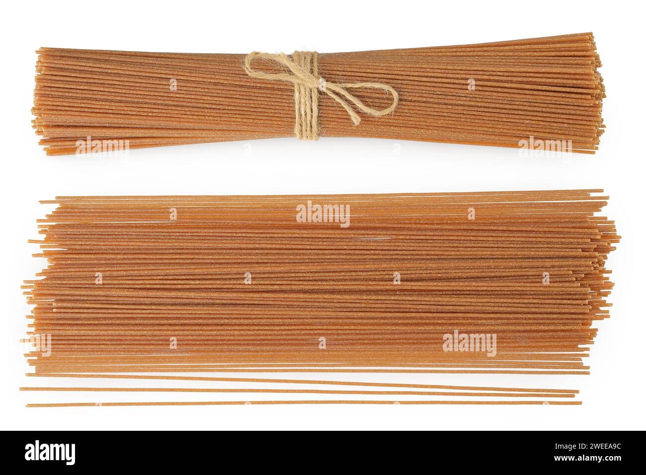 raw wholegrain spaghetti isolated on a white background. Top view. Flat ...
