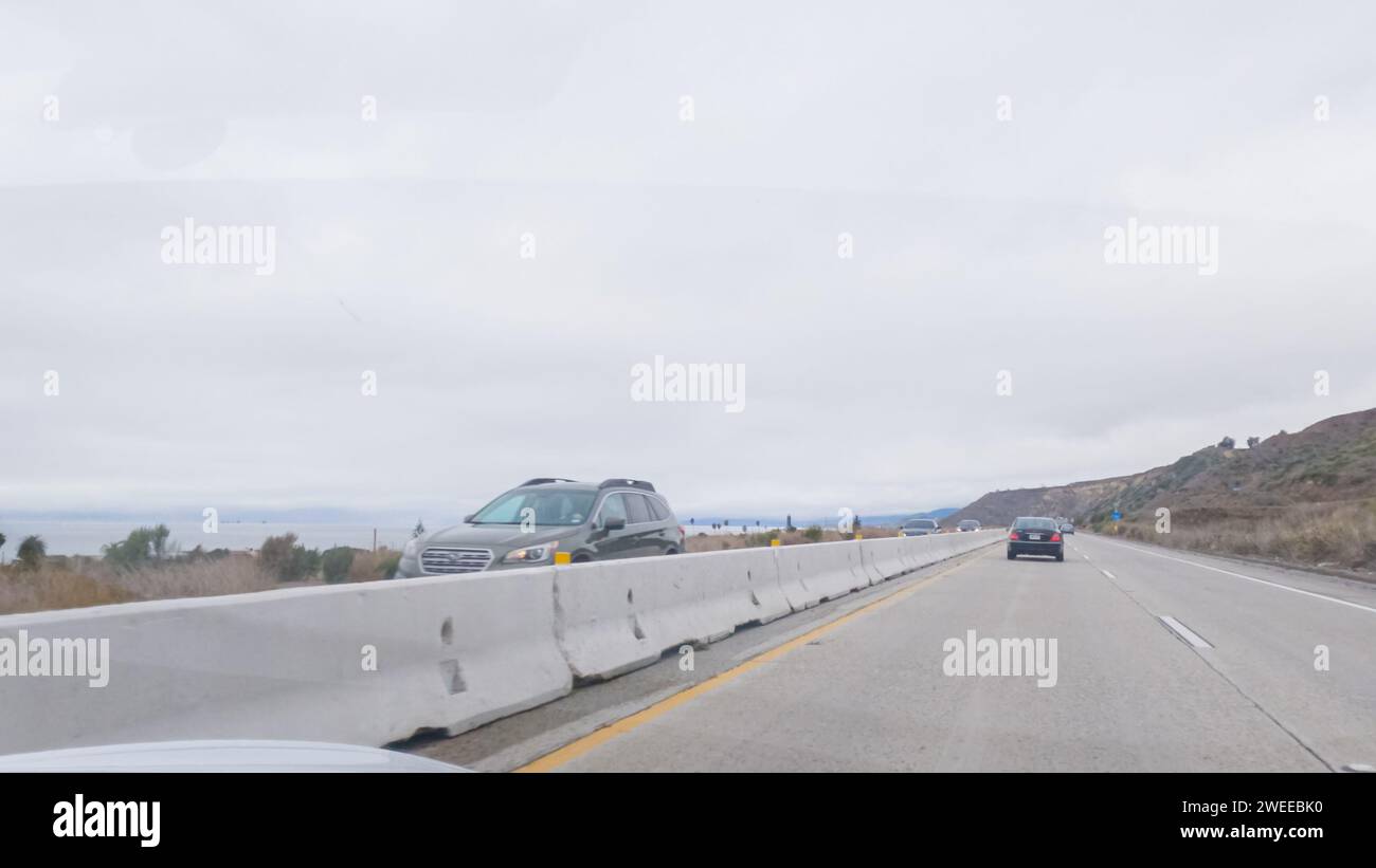 Gloomy Winter Drive by Rincon Beach, Highway 101 Stock Photo - Alamy