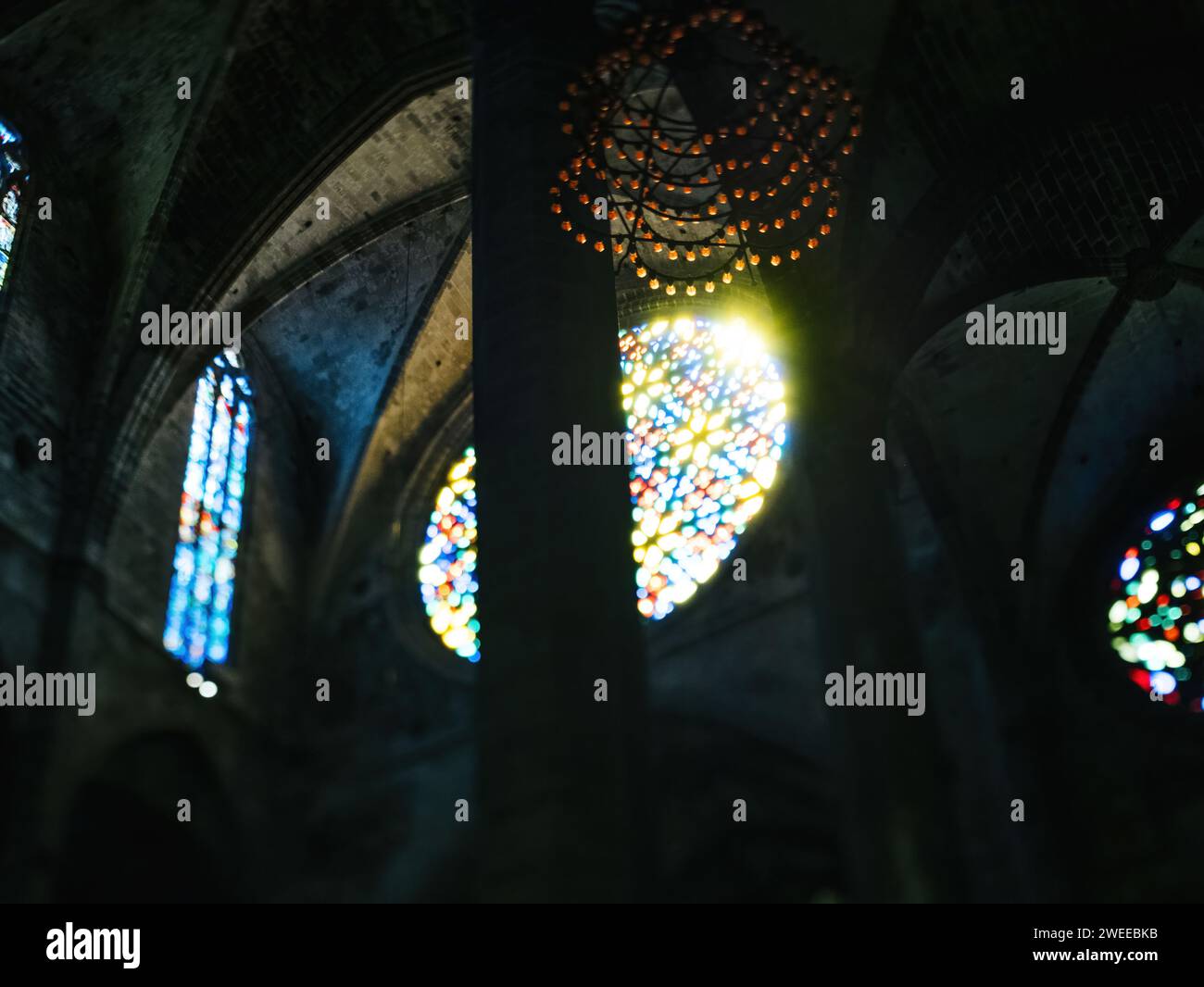 A captivating large stained glass window inside Palma de Mallorca ...