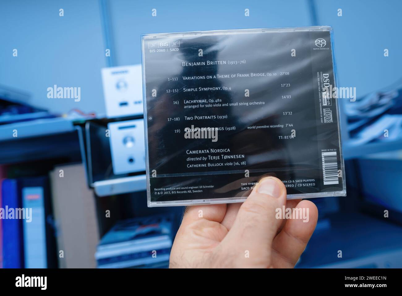 Paris, France - Dec 28, 2023: A male hand, in an audiophile's ...