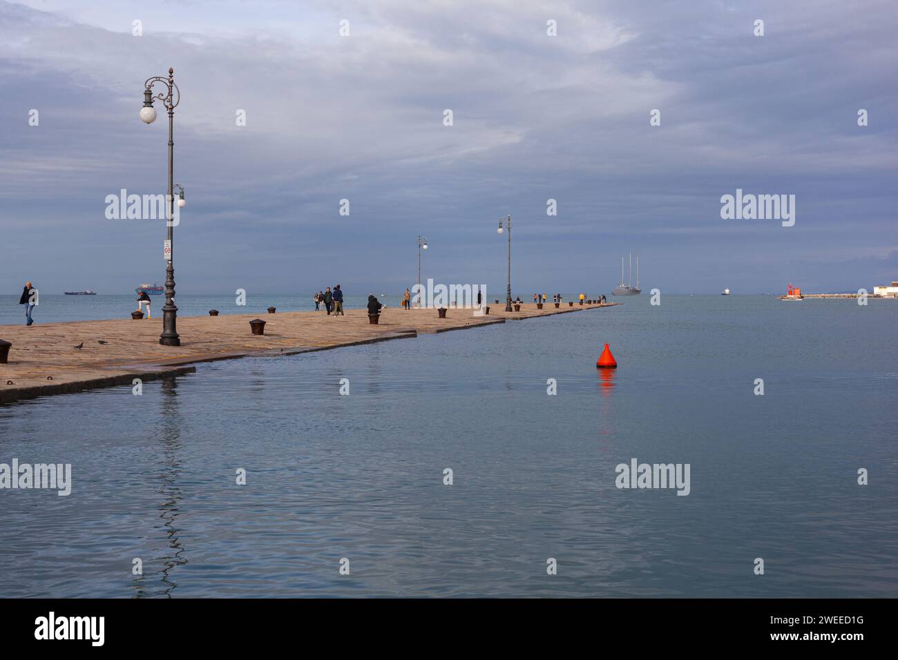 Treste, Italy - October 19, 2023: People on The Molo Audace pier of ...