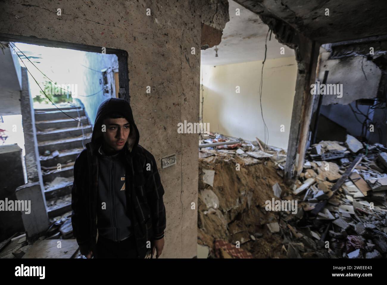Rafah, Palestinian Territories. 25th Jan, 2024. A Palestinian looks on ...