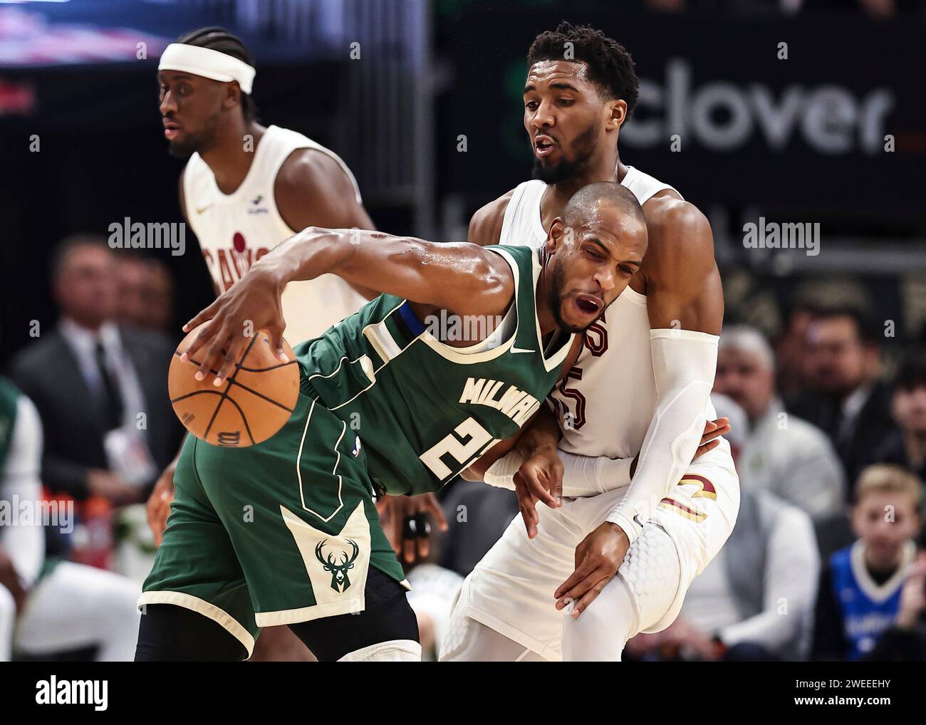 Milwaukee, USA. 24th Jan, 2024. Milwaukee Bucks forward Khris Middleton (front) collides with ...