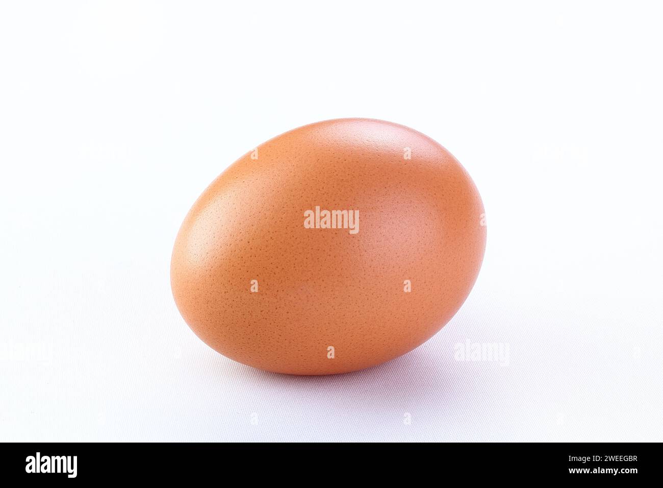 Fresh eggs on background hi-res stock photography and images - Alamy