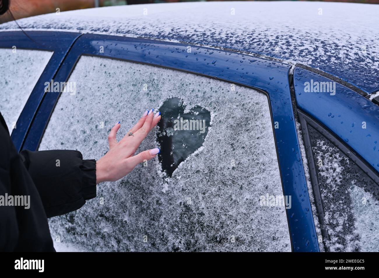 Heart shape on car window hi-res stock photography and images - Alamy