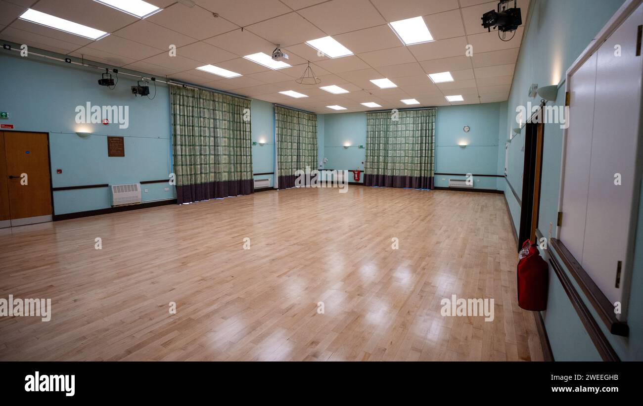 A Blue-walled room with wooden flooring Stock Photo - Alamy