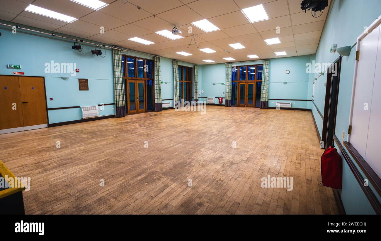 Spacious empty room with wooden floors, perfect for gatherings and ...