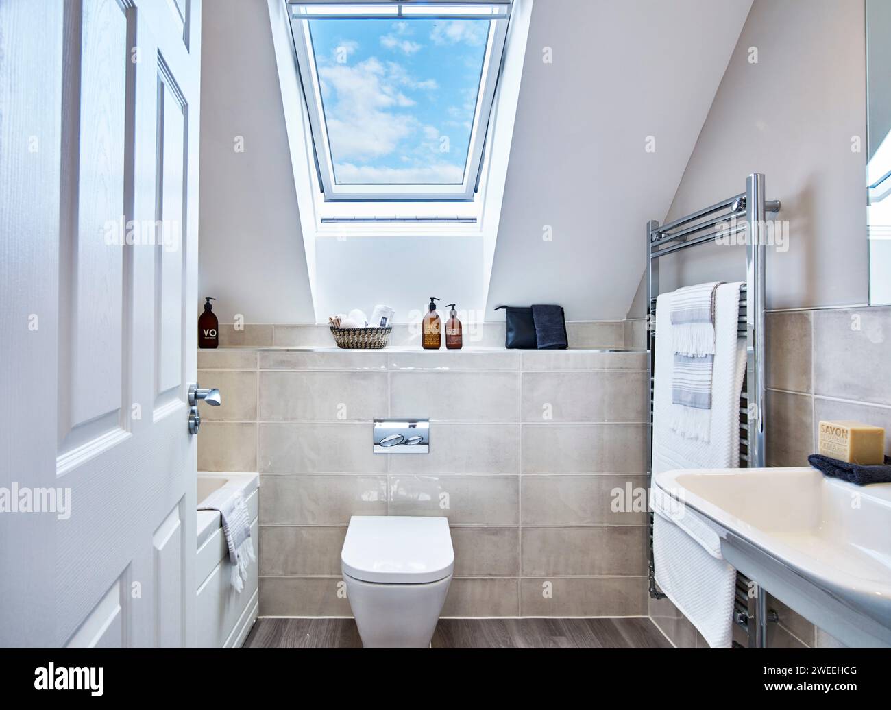 Bathroom with velux window Stock Photo - Alamy
