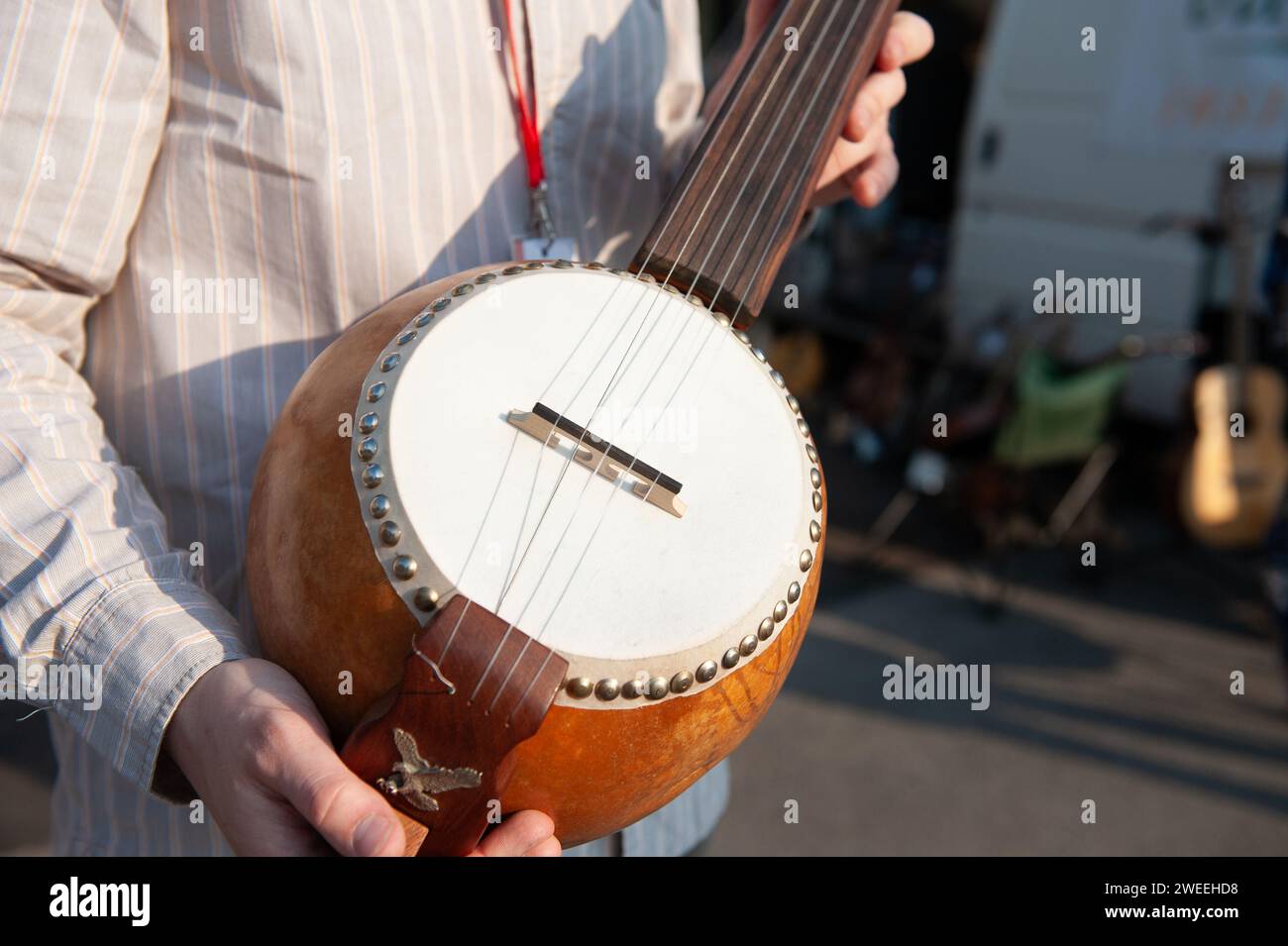 A homemade gourd banjo, A hybrid of the African Akontig and the ...