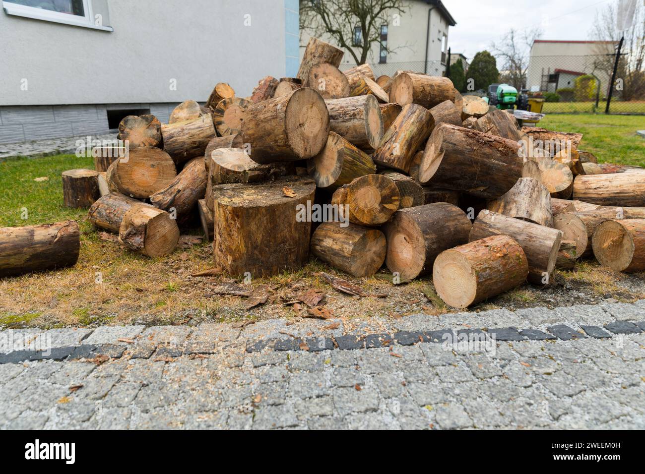 An ax for splitting firewood stuck into a stump for chopping wood Stock ...