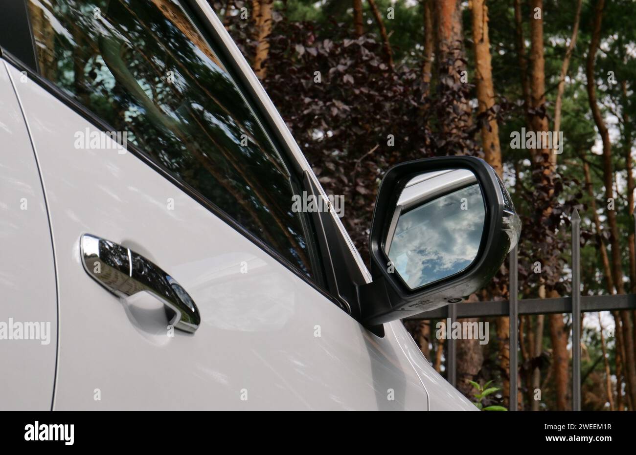 Bottom View Of Car Mirror With Reflection Of Clouds In It Stock Photo ...