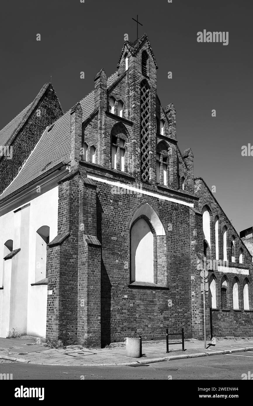 Historical red brick gothic church in Poznan city, Poland, monochrome ...